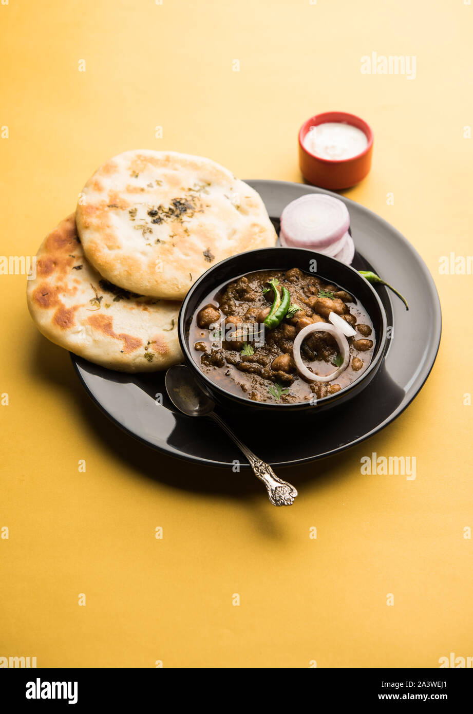 Pindi Chole Kulche or roadside choley Kulcha popular in India and ...