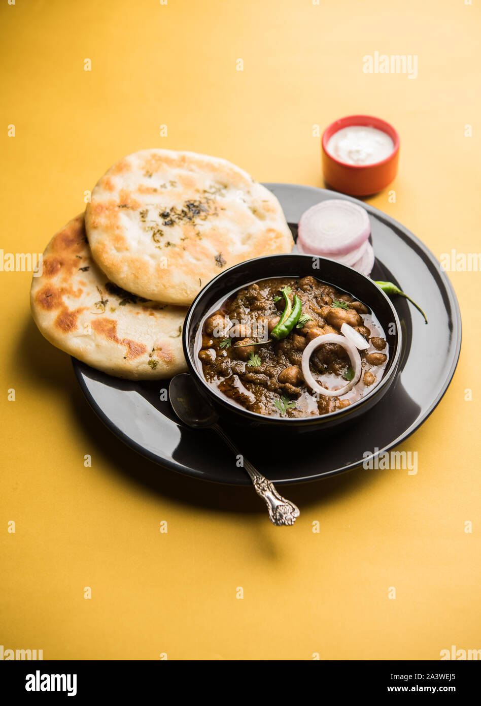 Pindi Chole Kulche or roadside choley Kulcha popular in India and ...