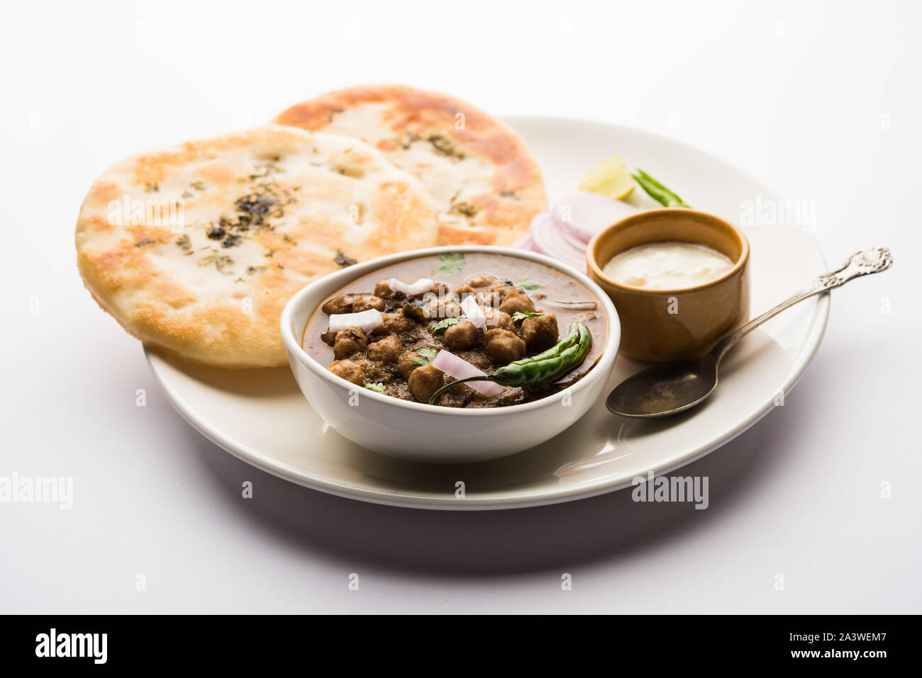 Pindi Chole Kulche or roadside choley Kulcha popular in India and ...