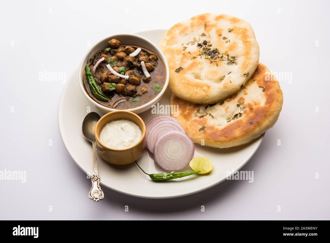 Pindi Chole Kulche or roadside choley Kulcha popular in India and ...