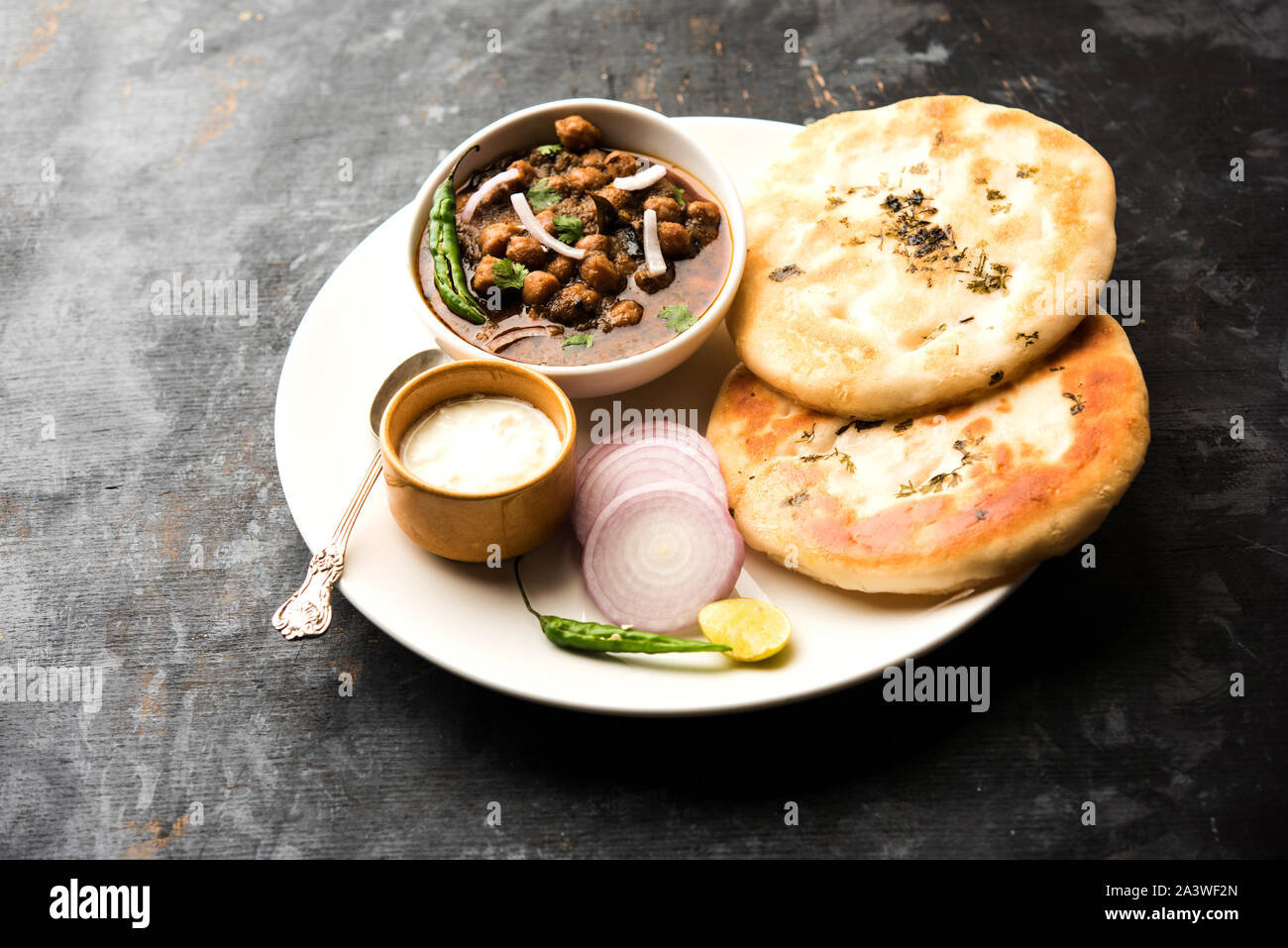 Pindi Chole Kulche or roadside choley Kulcha popular in India and ...