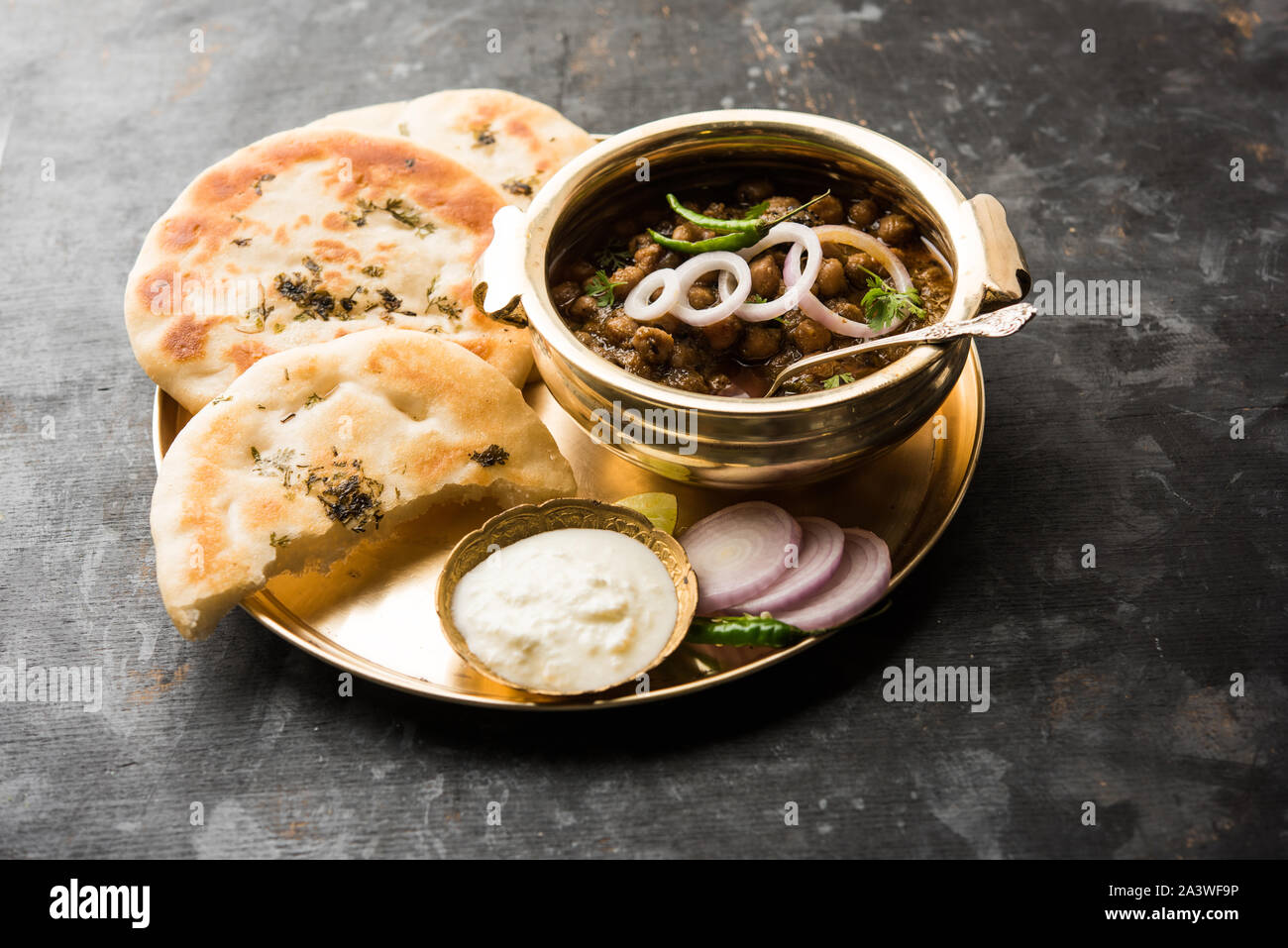 Pindi Chole Kulche or roadside choley Kulcha popular in India and ...