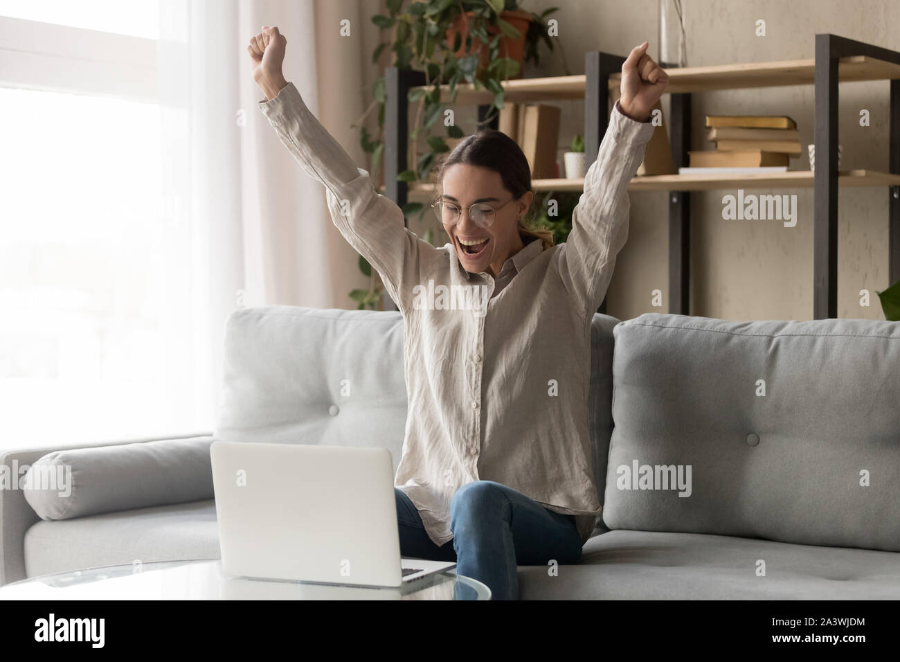 Excited student girl using hi-res stock photography and images - Alamy