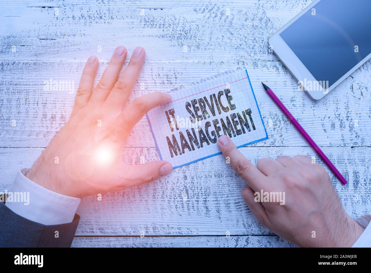 Writing note showing It Service Management. Business concept for ...
