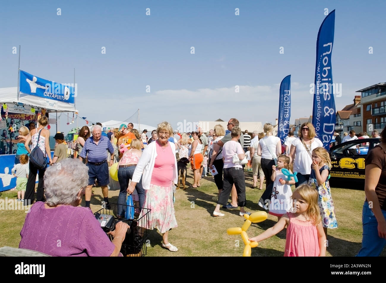 Crowds at a local fair Stock Photo - Alamy