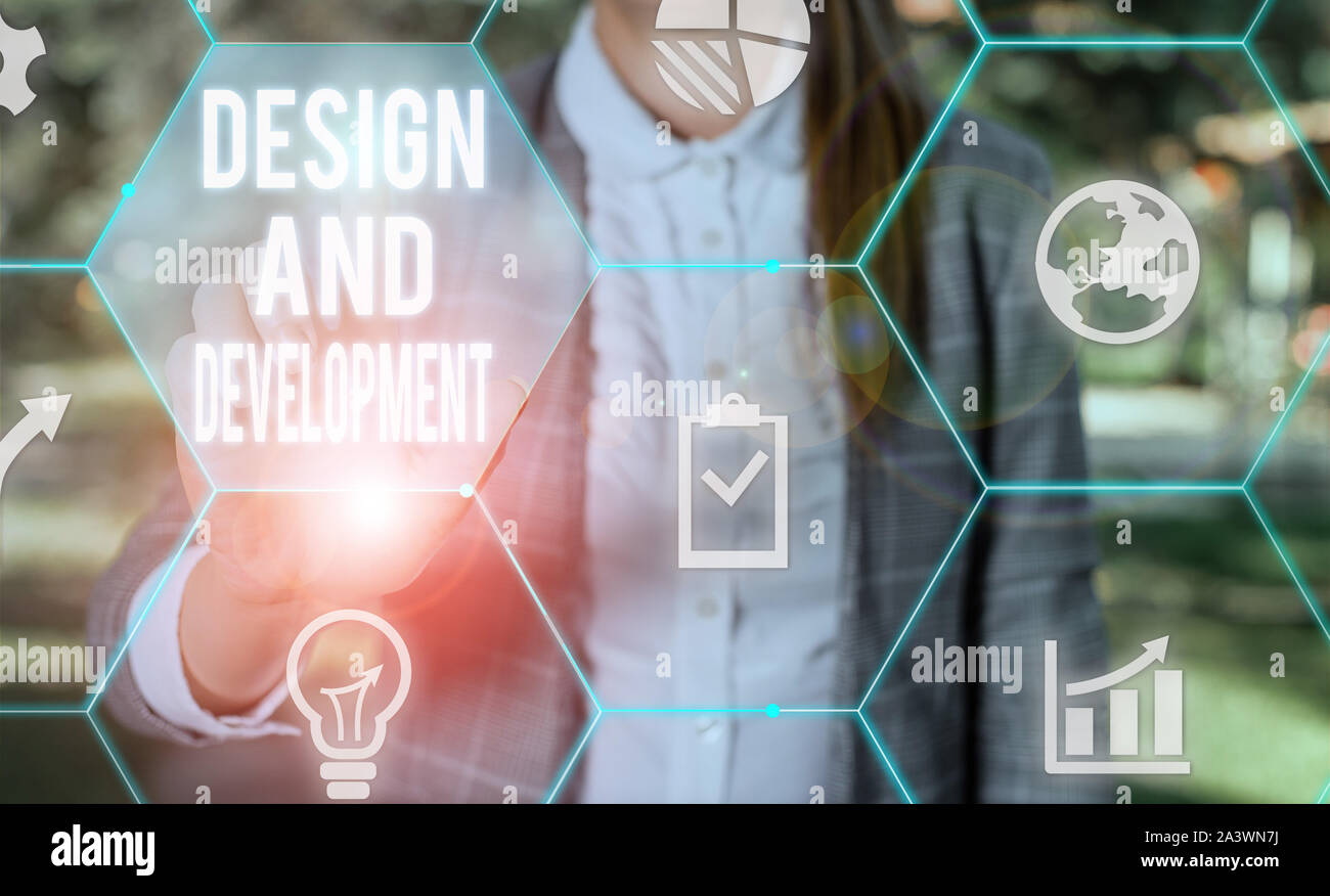 Writing note showing Design And Development. Business concept for ...