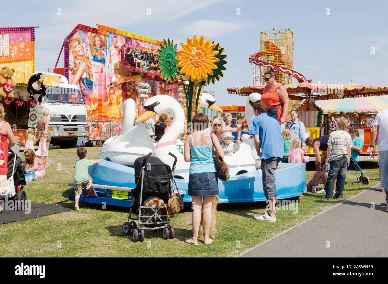 Children's 'swan' ride at a fair Stock Photo - Alamy