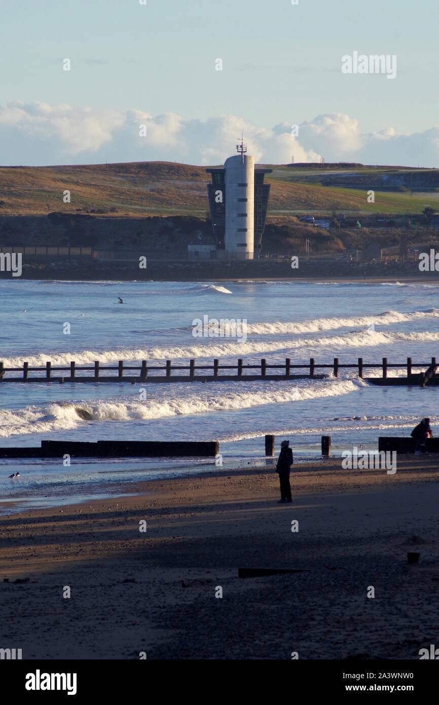 Aberdeen Harbour Control Tower beyond the Sandy Beach. Scotland, UK ...