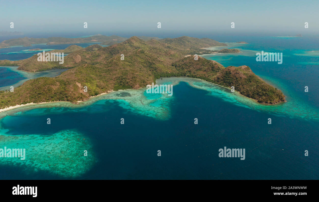 aerial view tropical islands with blue lagoon, coral reef and sandy ...