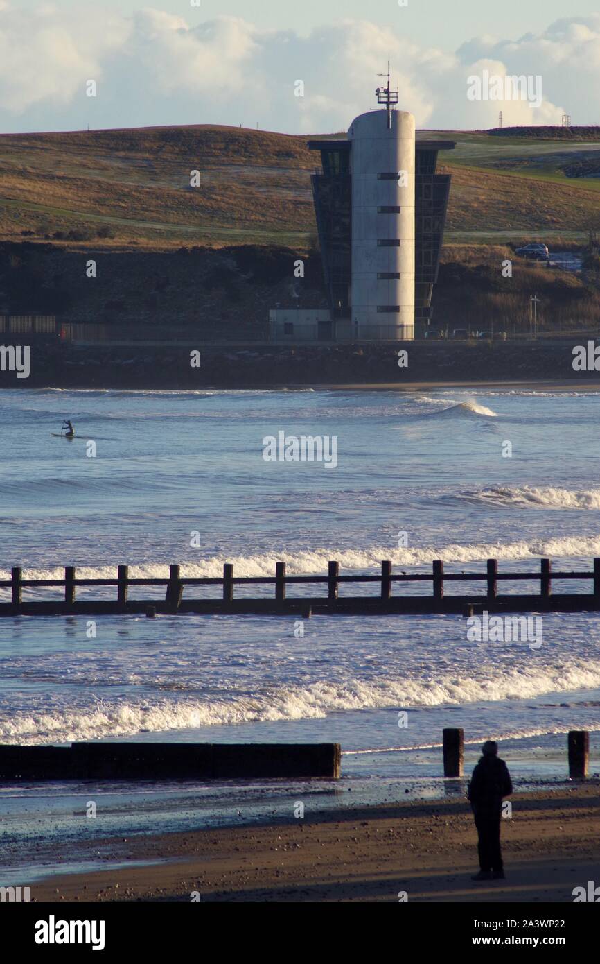 Aberdeen Harbour Control Tower beyond the Sandy Beach. Scotland, UK ...