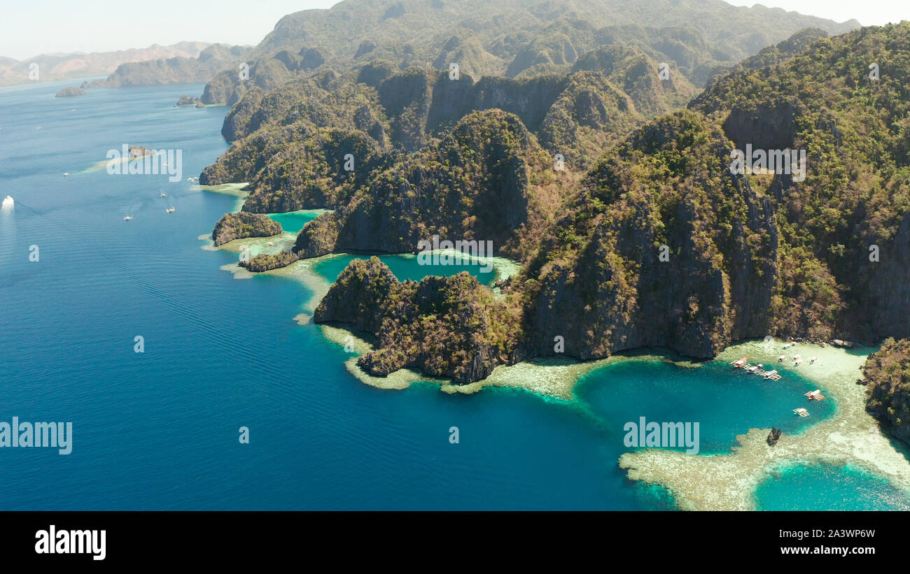 Tourist boats around the beautiful big and small lagoons, aerial view ...