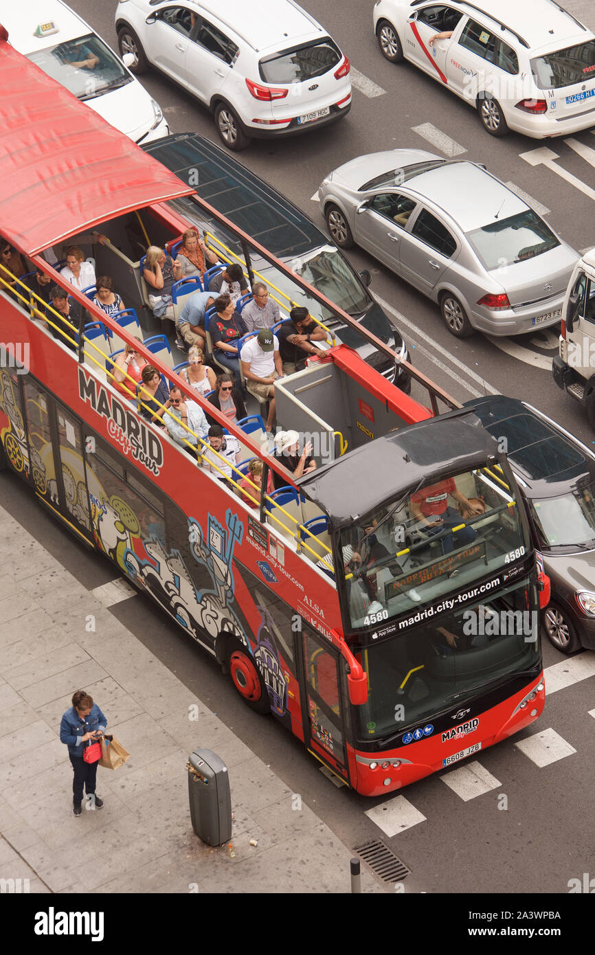 Tourist Bus on a busy street Stock Photo - Alamy
