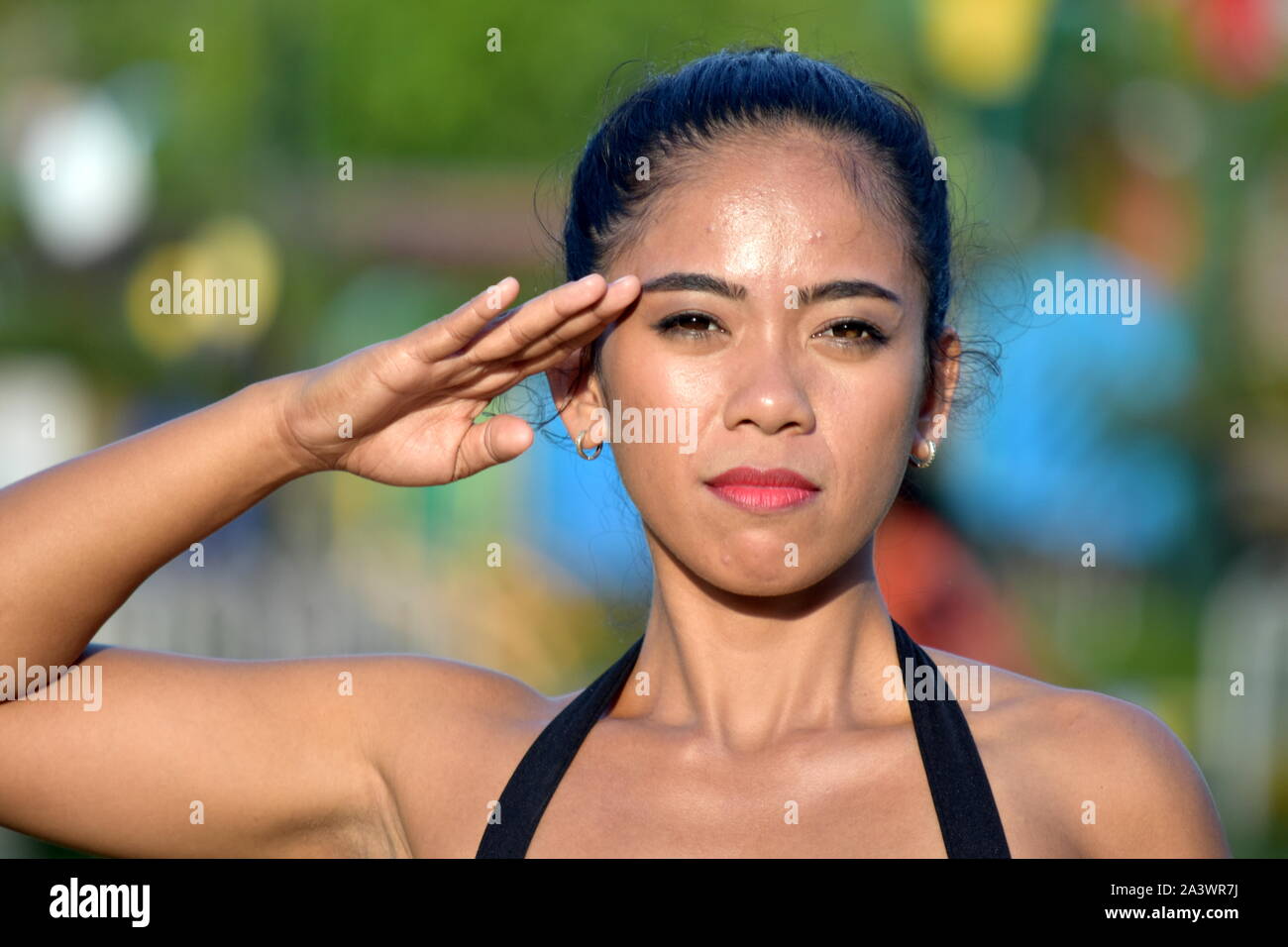Saluting Beautiful Female Stock Photo - Alamy