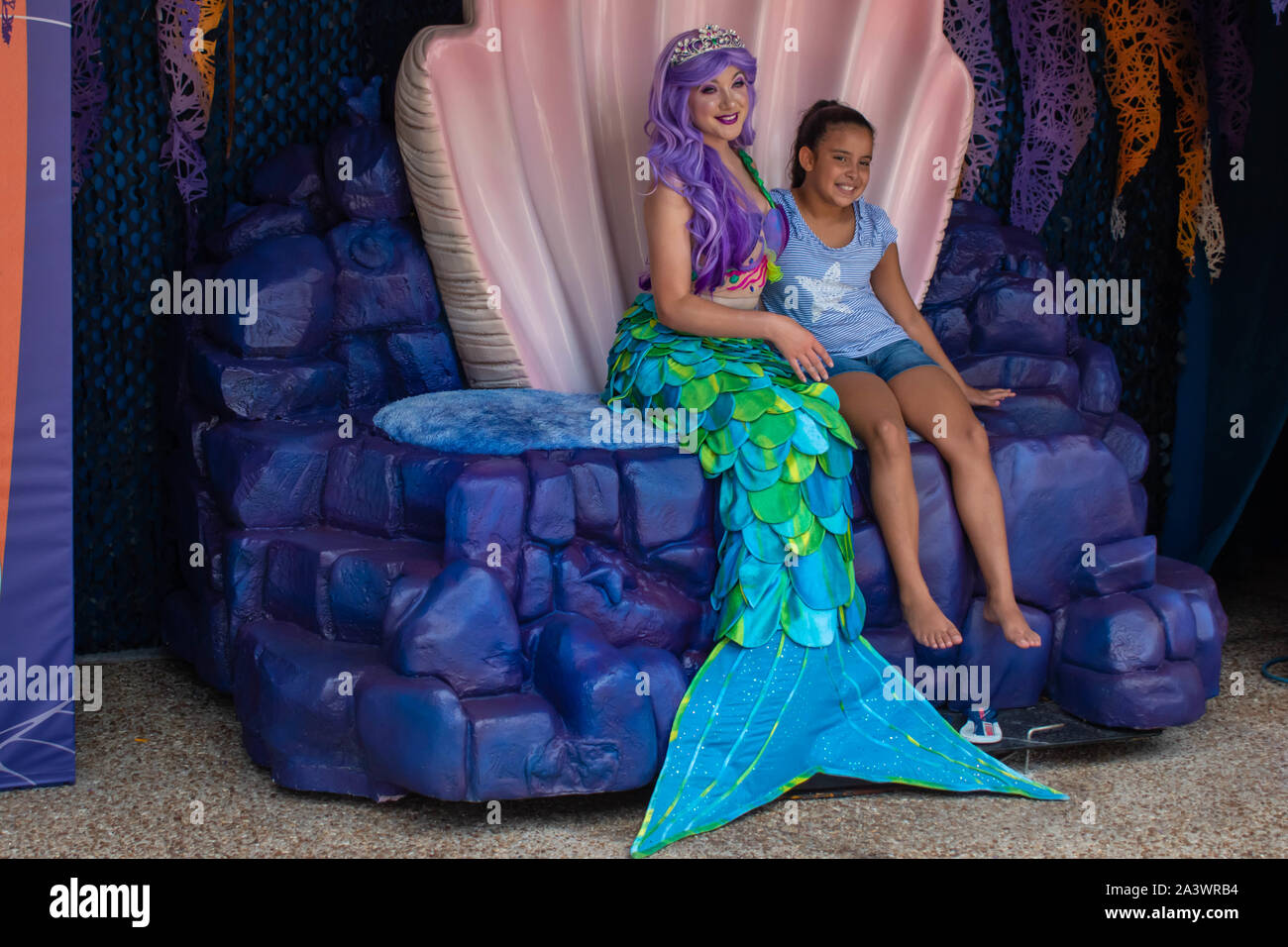 Orlando, Florida. September 21, 2019. Mermaid with little gir at ...