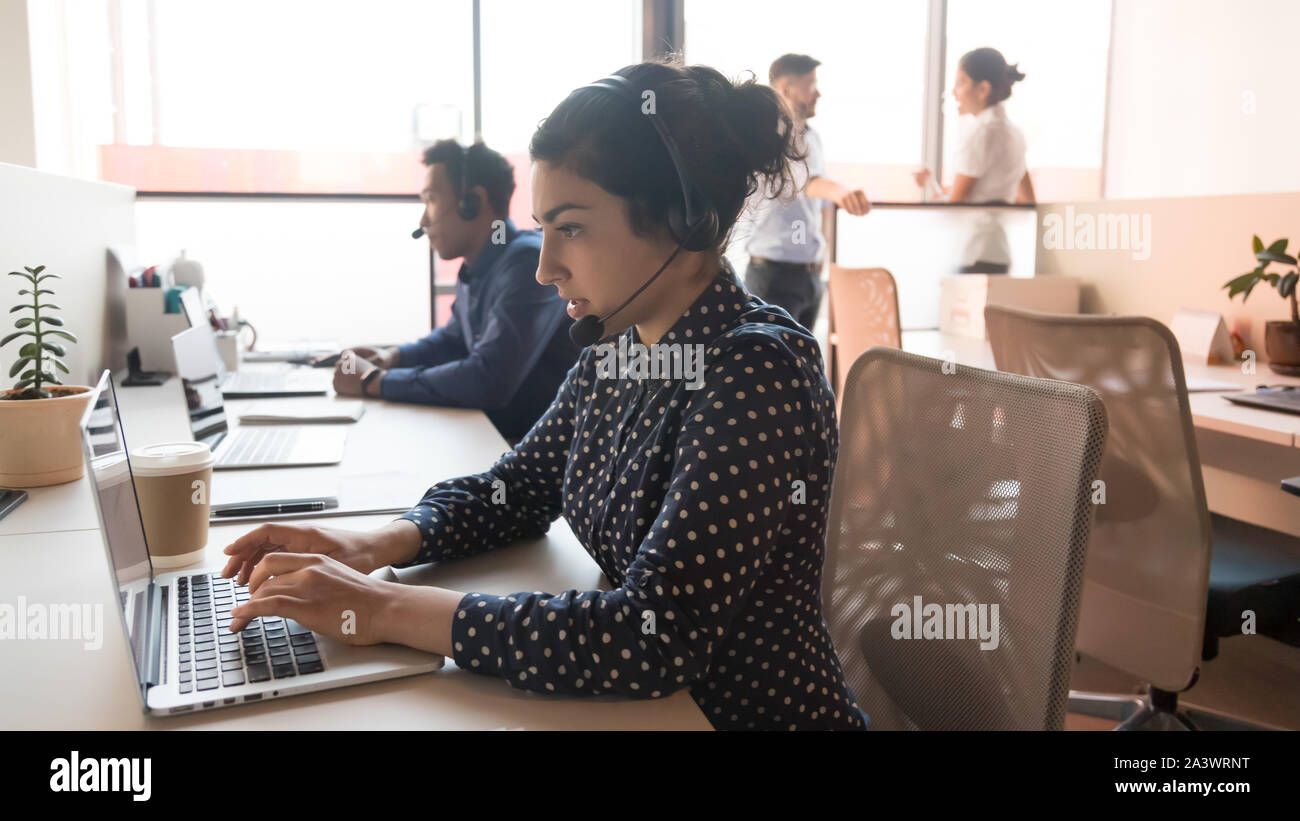 Indian woman call center operator working in customer service office ...