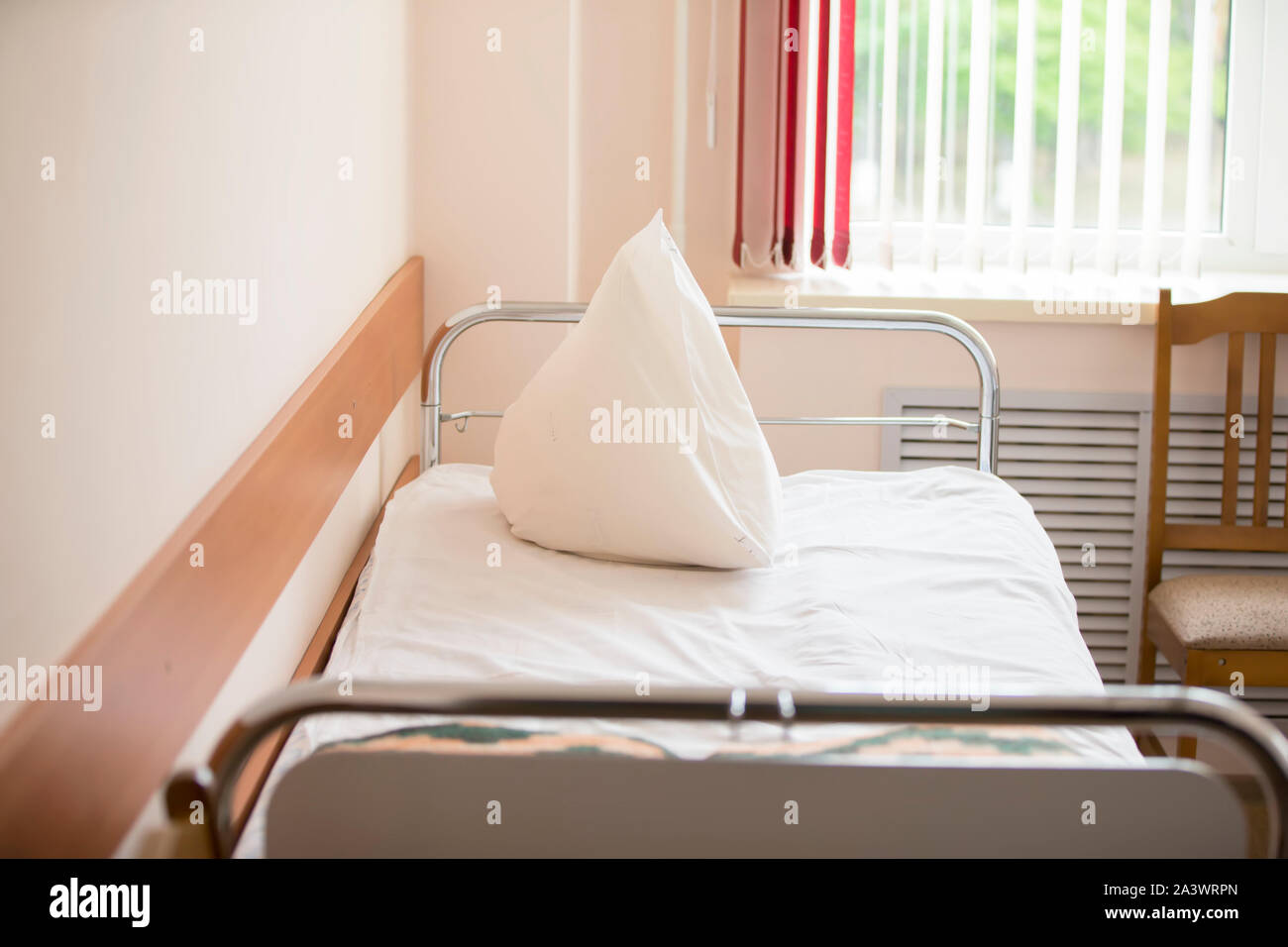 Bed in the hospital ward of the Russian hospital.Interior of the Soviet ...