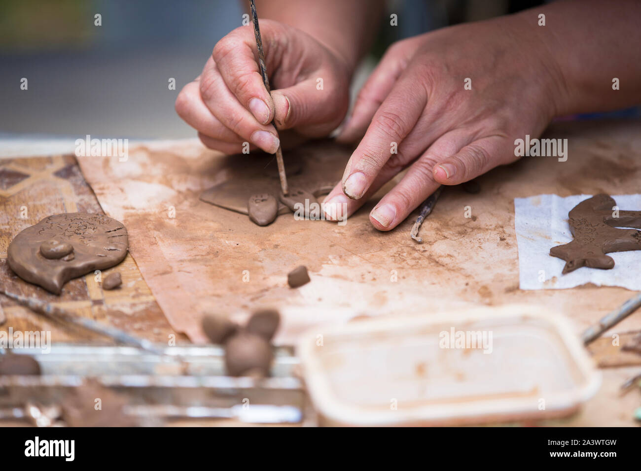 Hands make crafts from clay. Sculpt Stock Photo - Alamy
