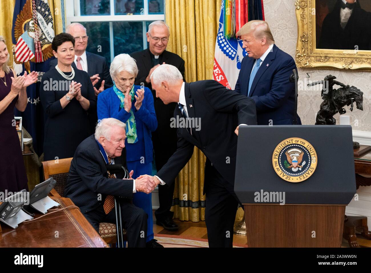 U.S Vice President Mike Pence, center, congratulates former Attorney ...