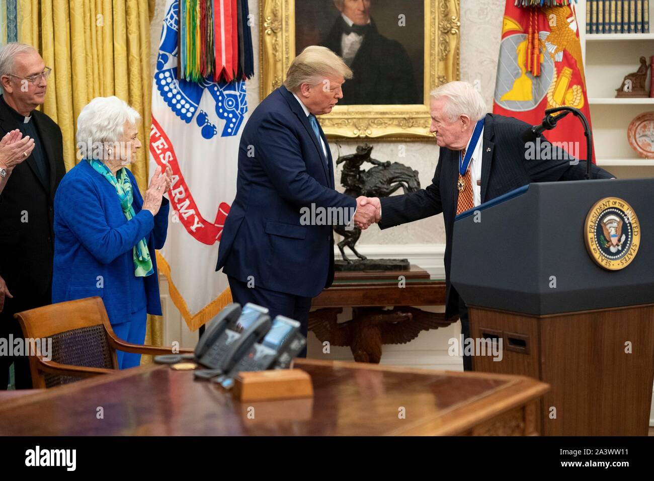 U.S President Donald Trump congratulates former Attorney General Edwin ...