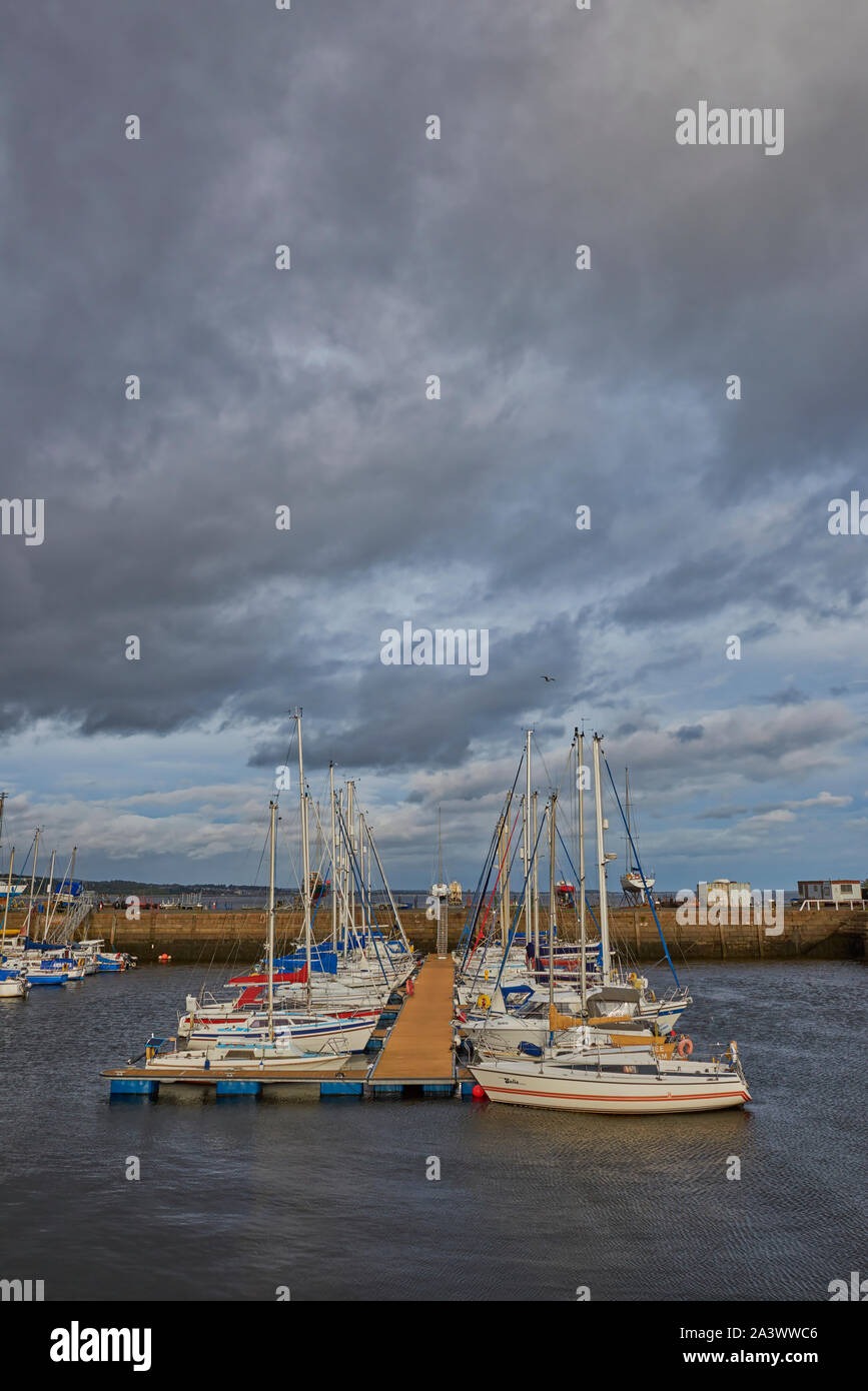 Yachts moored next to a floating Pontoon inside the Marina within the ...