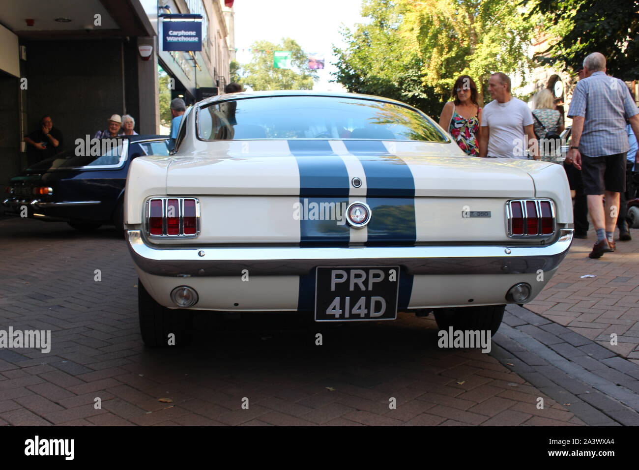 1968 ford mustang gt in white with ford blue racing stripes Stock Photo ...