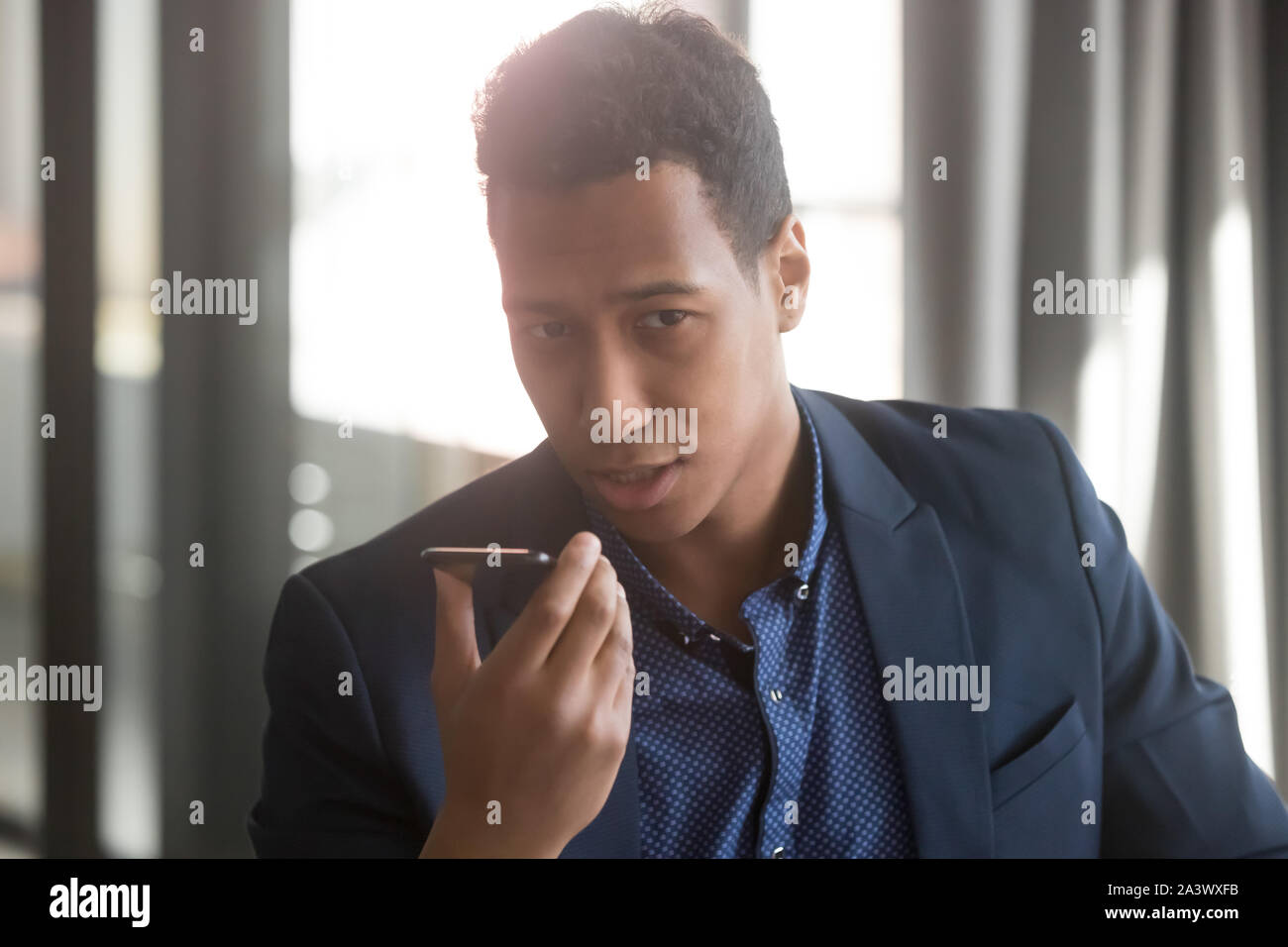 Businessman using speak activate hi-res stock photography and images ...