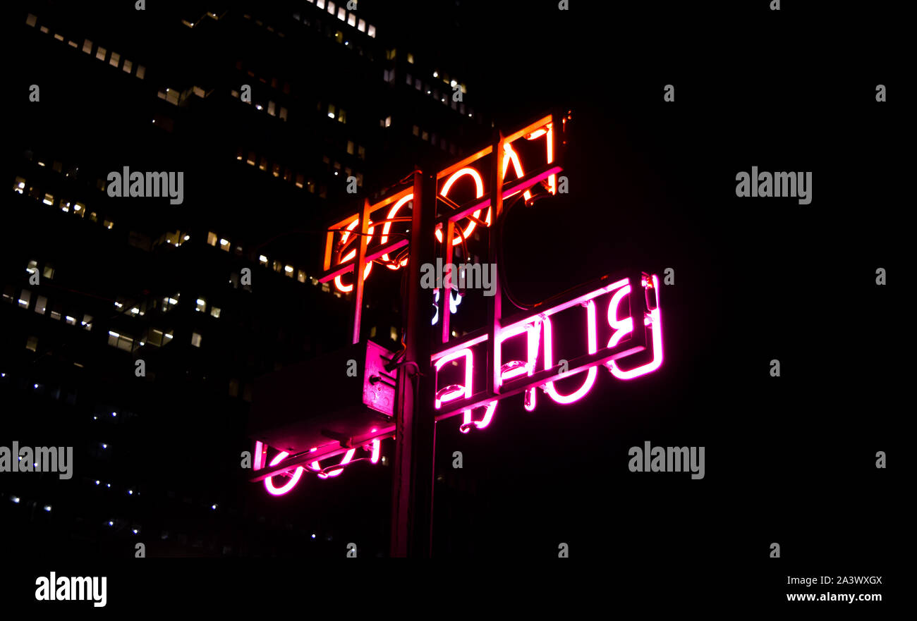 neon sign from behind Stock Photo - Alamy