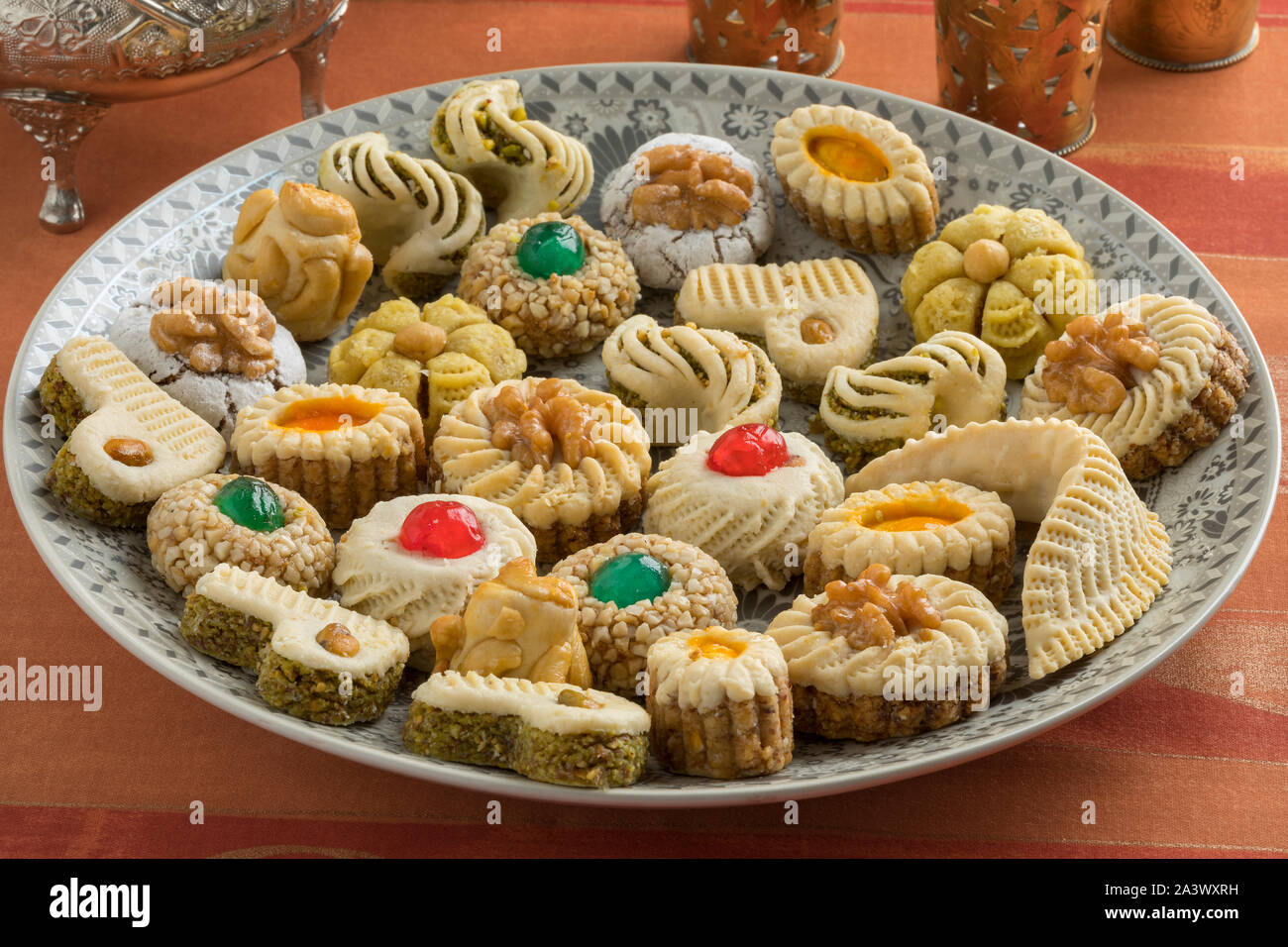 Diversity of traditional festive Moroccan cookies on a dish and tea ...