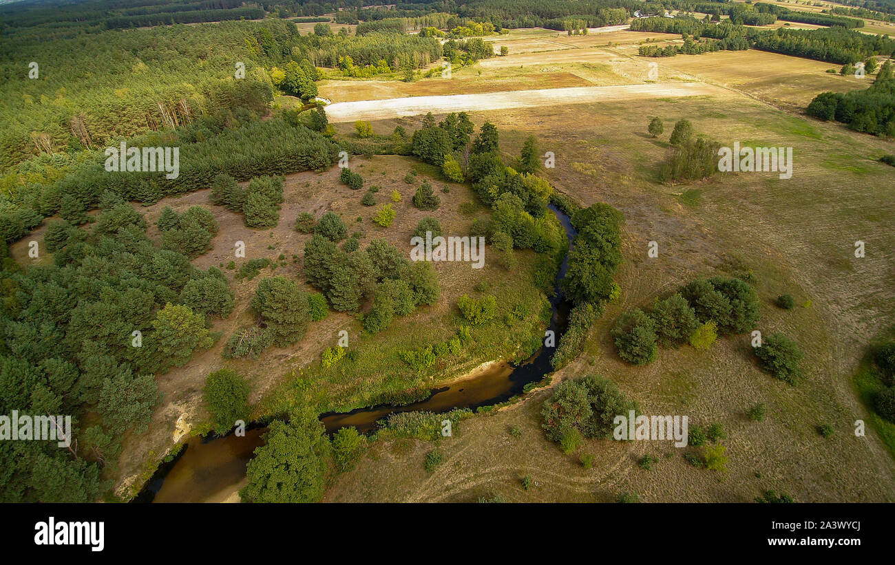 The mysterious river Grabia on a summer day, Poland, 2019 Stock Photo ...