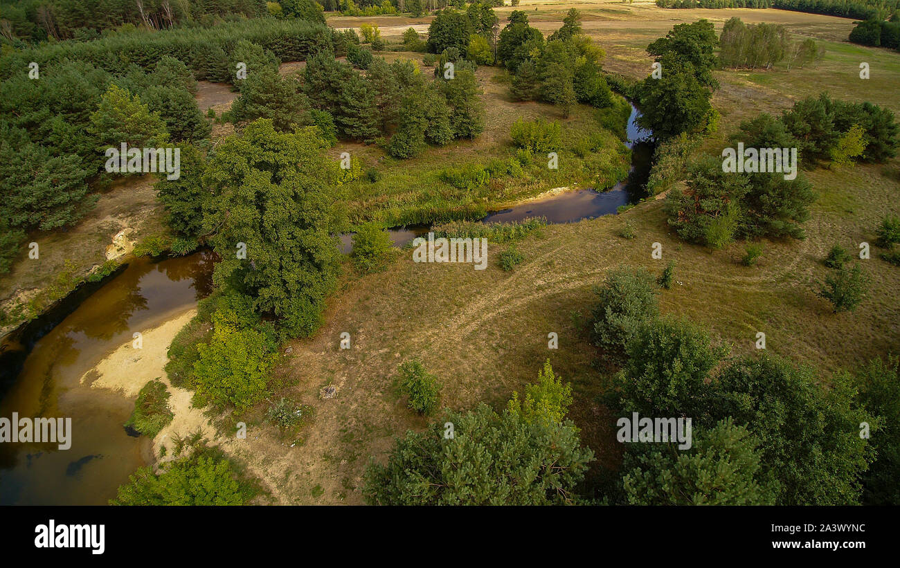 The mysterious river Grabia on a summer day, Poland, 2019 Stock Photo ...