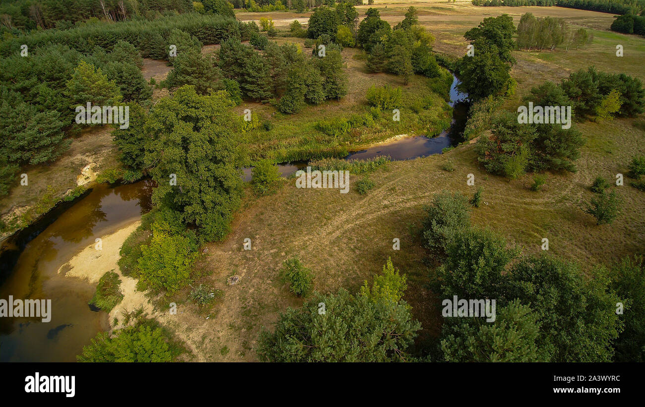 The mysterious river Grabia on a summer day, Poland, 2019 Stock Photo ...
