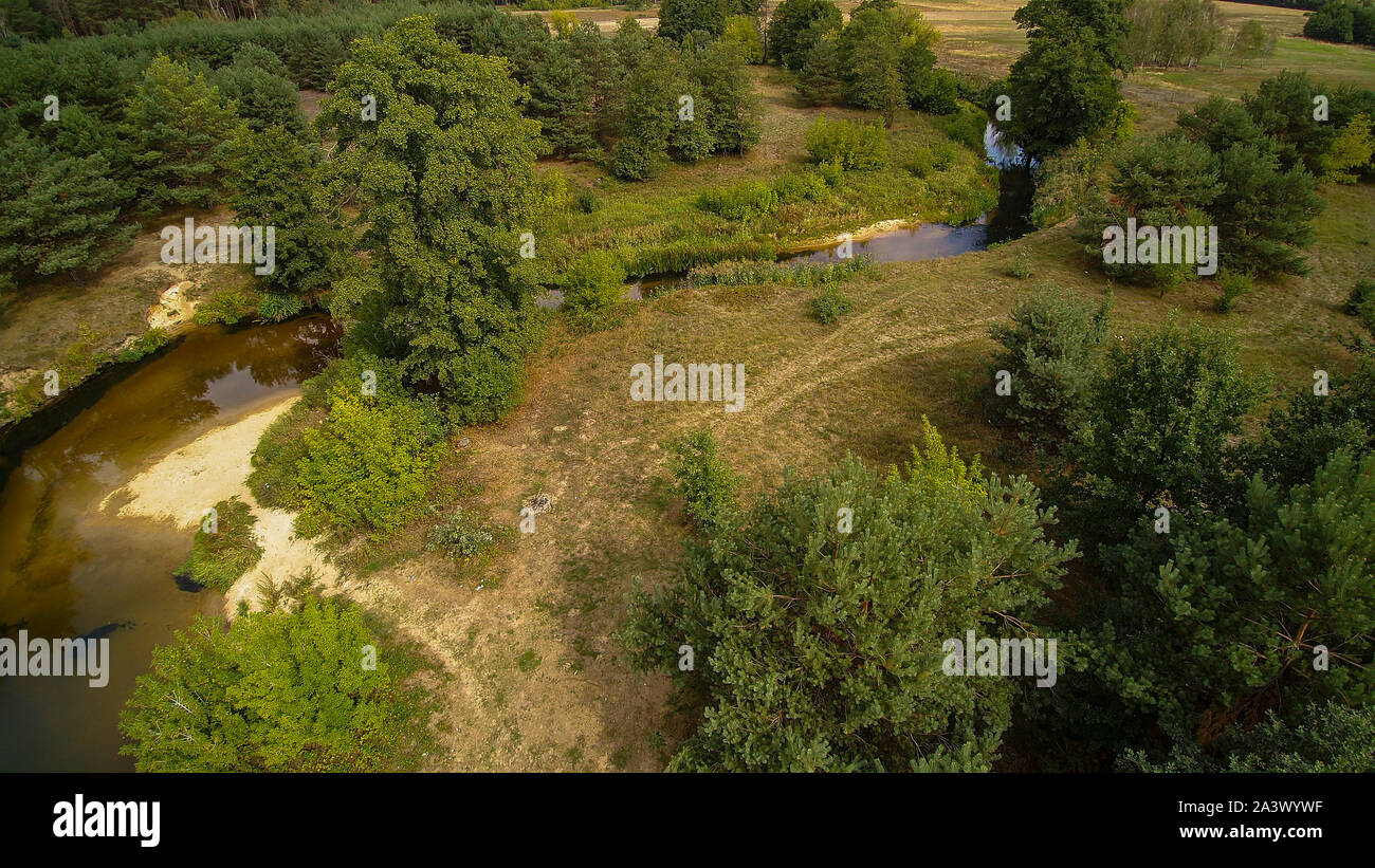 The mysterious river Grabia on a summer day, Poland, 2019 Stock Photo ...