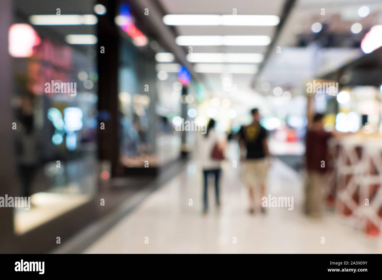Blur image of Shopping mall or exhibition hall and people for ...