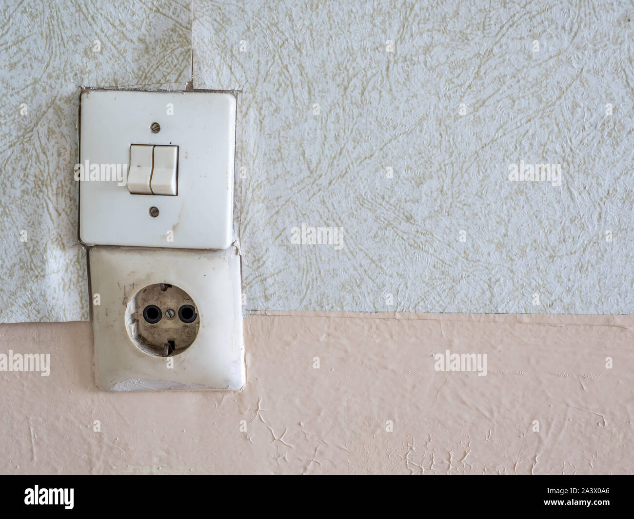 Old light switch and outlet in the apartment Stock Photo - Alamy