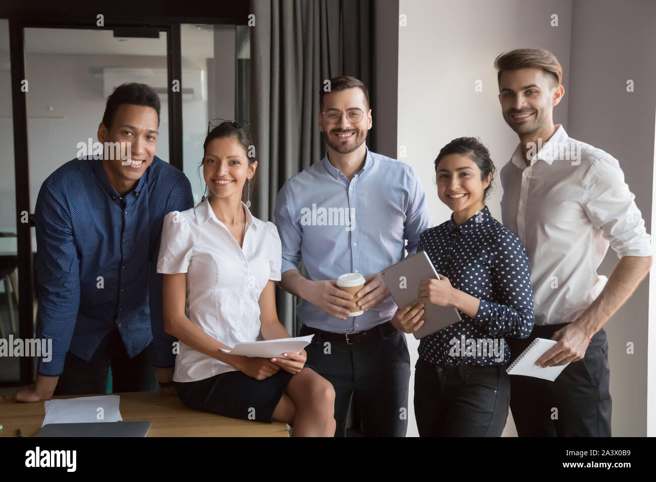 Happy professional people hi-res stock photography and images - Alamy