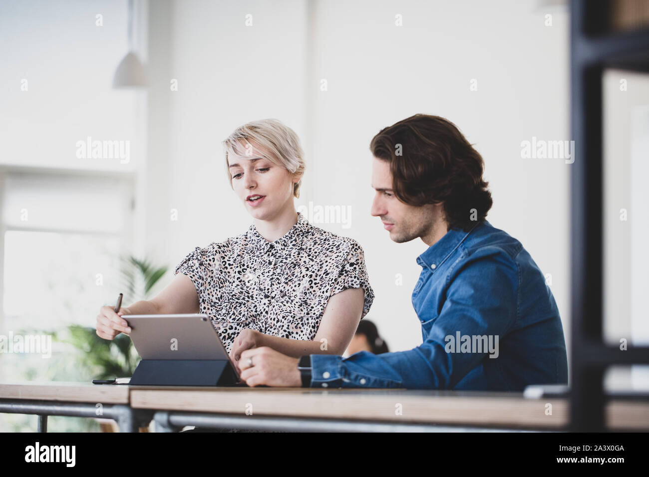 Business meeting digital technology hi-res stock photography and images ...