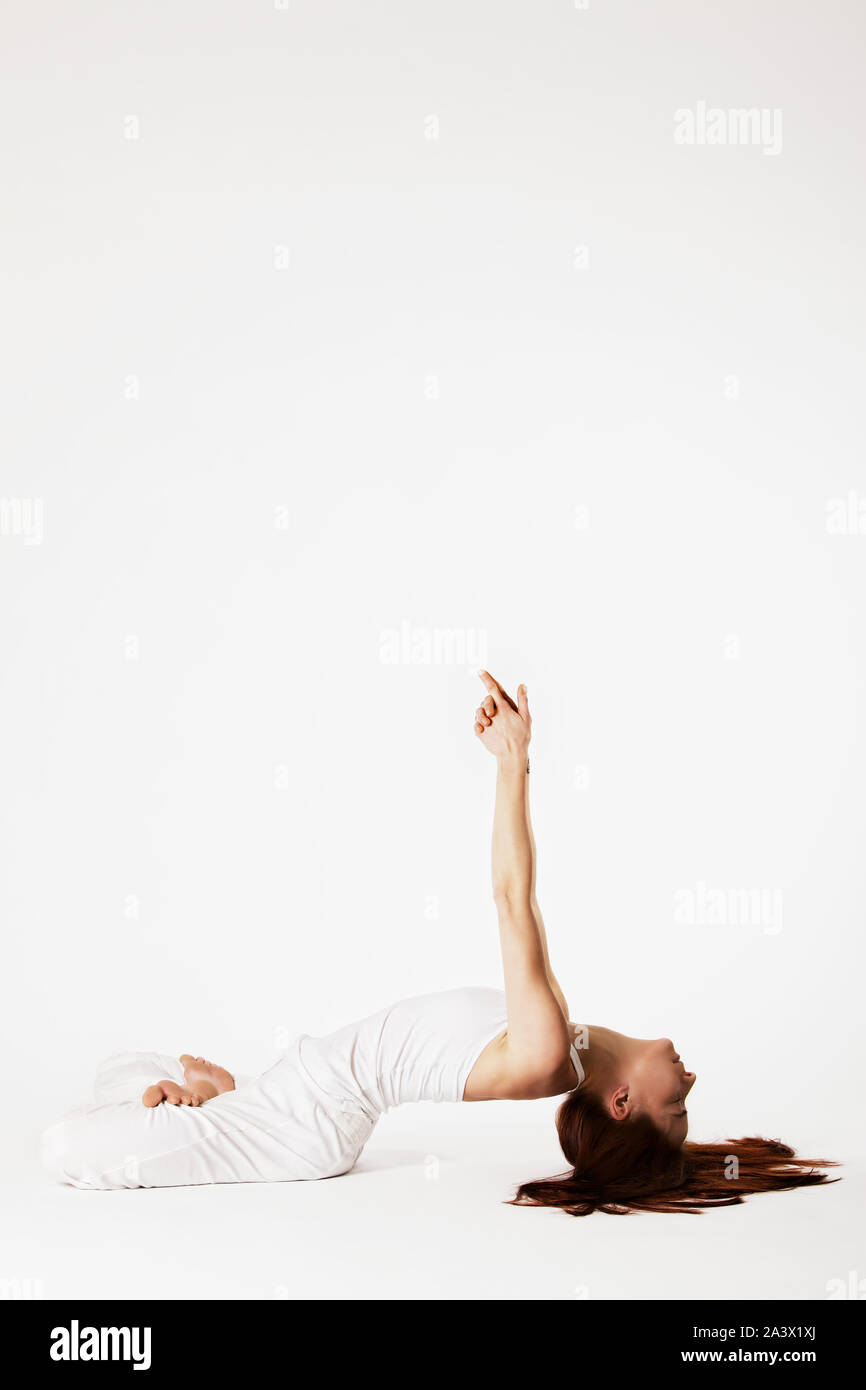 Woman in fish Yoga posture (Matsyasana Stock Photo - Alamy