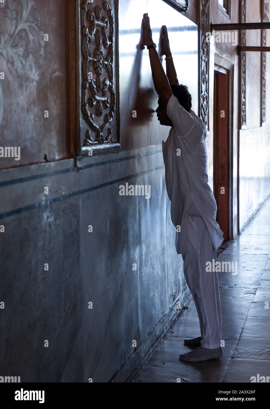Indian man praying in a temple, Rajasthan, Jaipur, India Stock Photo ...