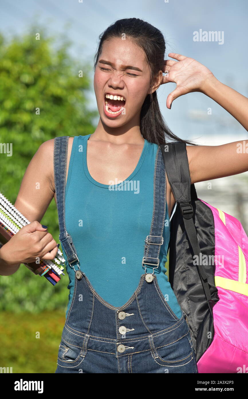 Female Student Under Stress With Notebooks Stock Photo - Alamy