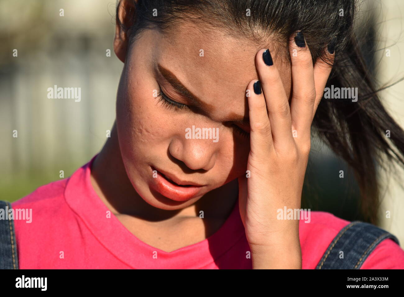 Sad Young Filipina Adult Female Stock Photo - Alamy