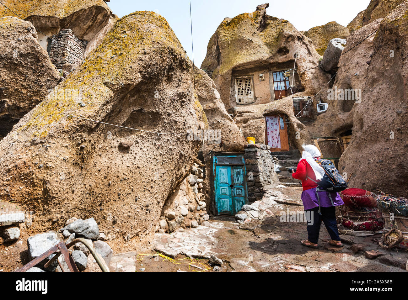 A student in Kandovan, manmade cliff dwellings village, Central ...