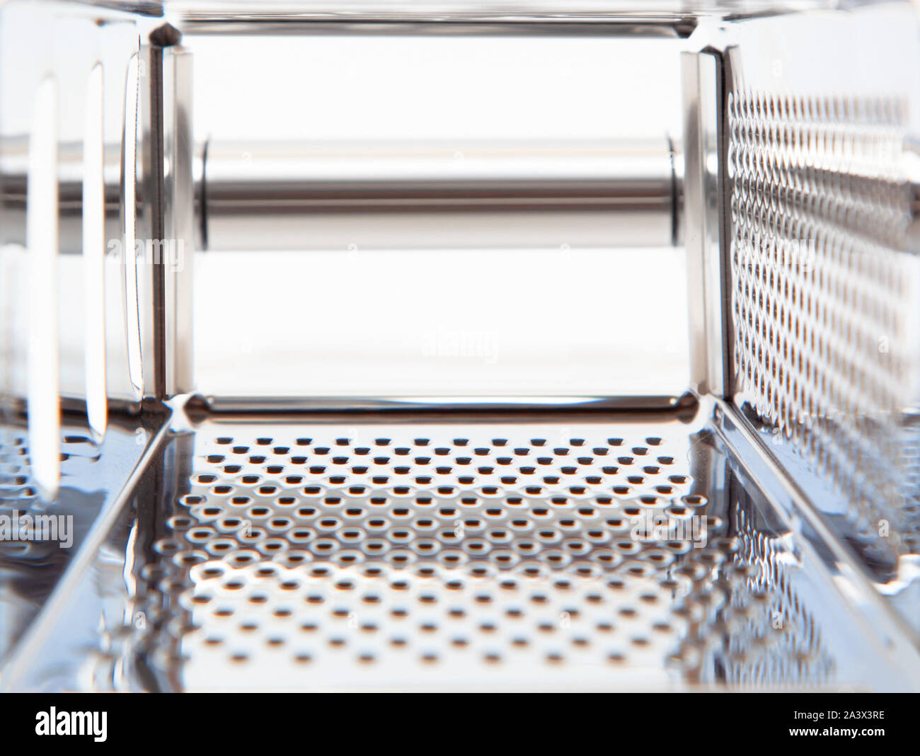 Grater blade. Texture of the chrome metal blades. Inside view of the ...