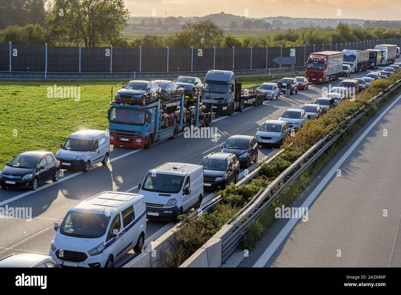 Traffic jam with emergency lane (german rettungsgasse) to rush hour on ...