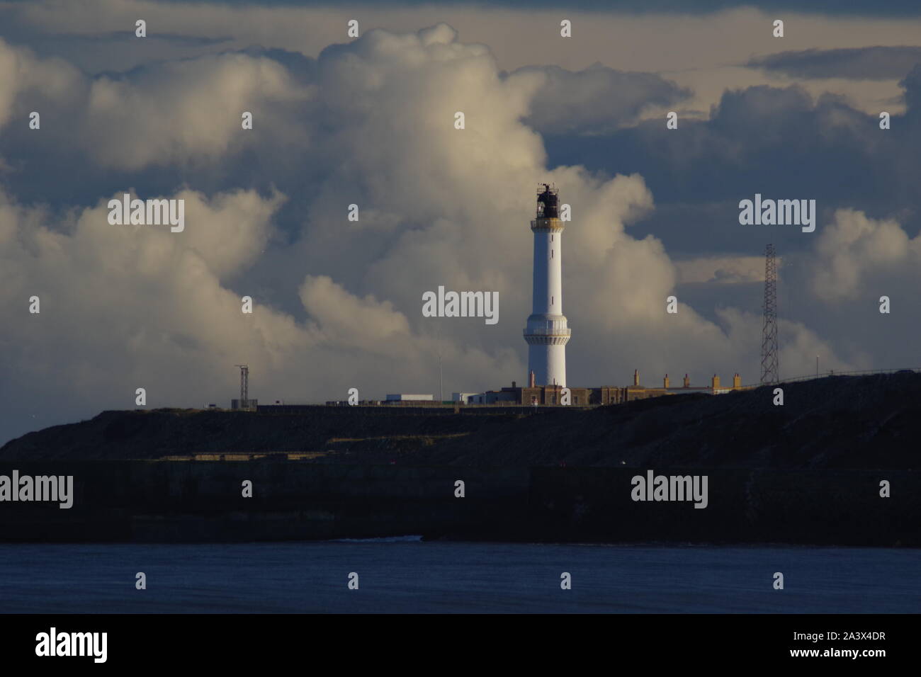 Girdle Ness Lighthouse by Aberdeen Harbour on a winters Evening with ...