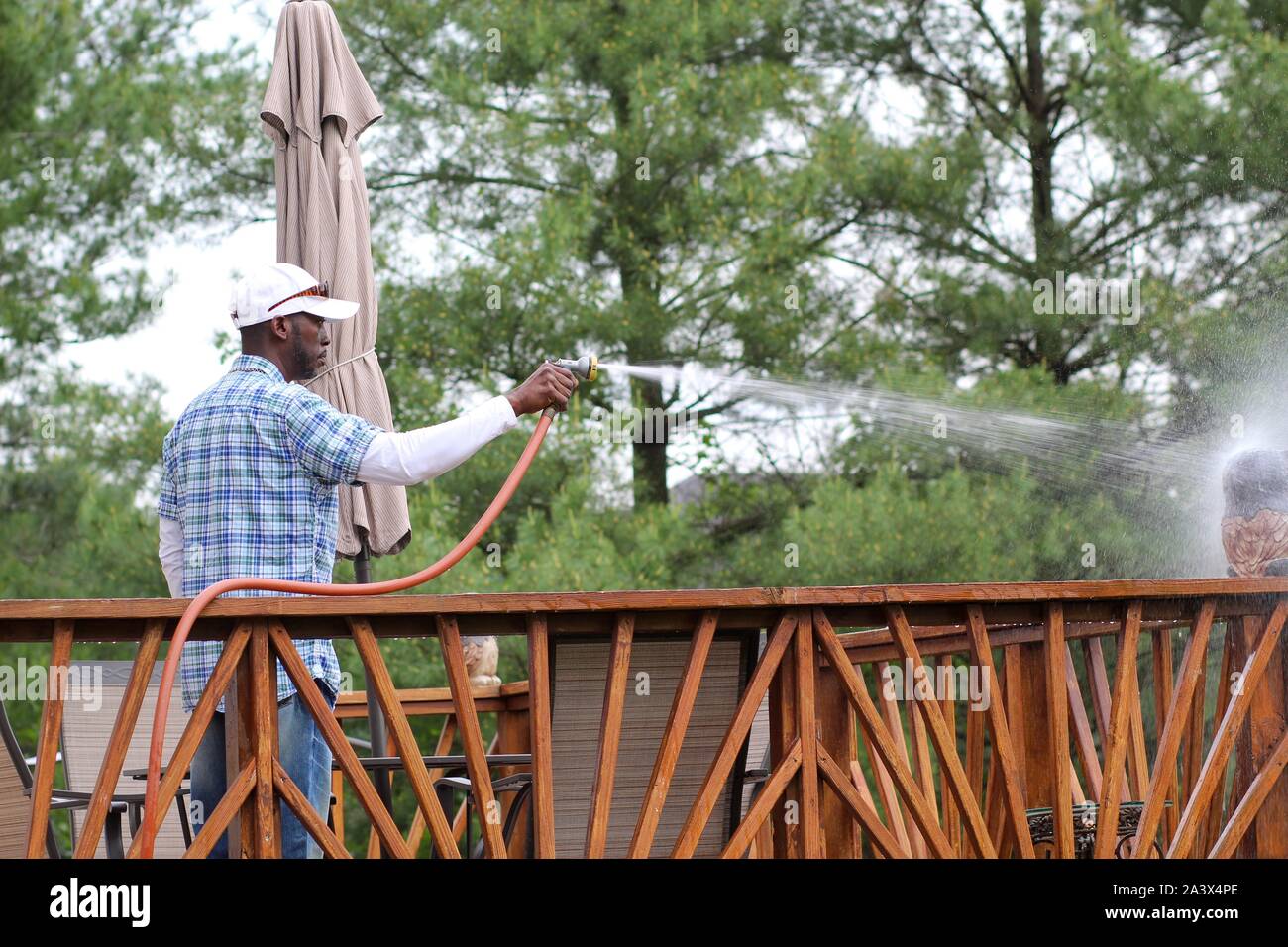 Watering hoses hi-res stock photography and images - Alamy