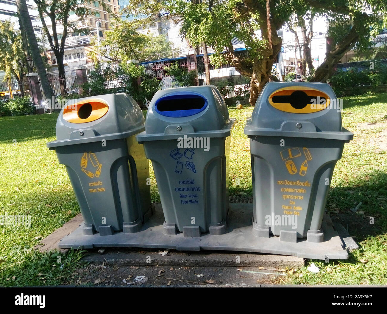 Three baskets for different garbage in a lumpini park in bangkok ...