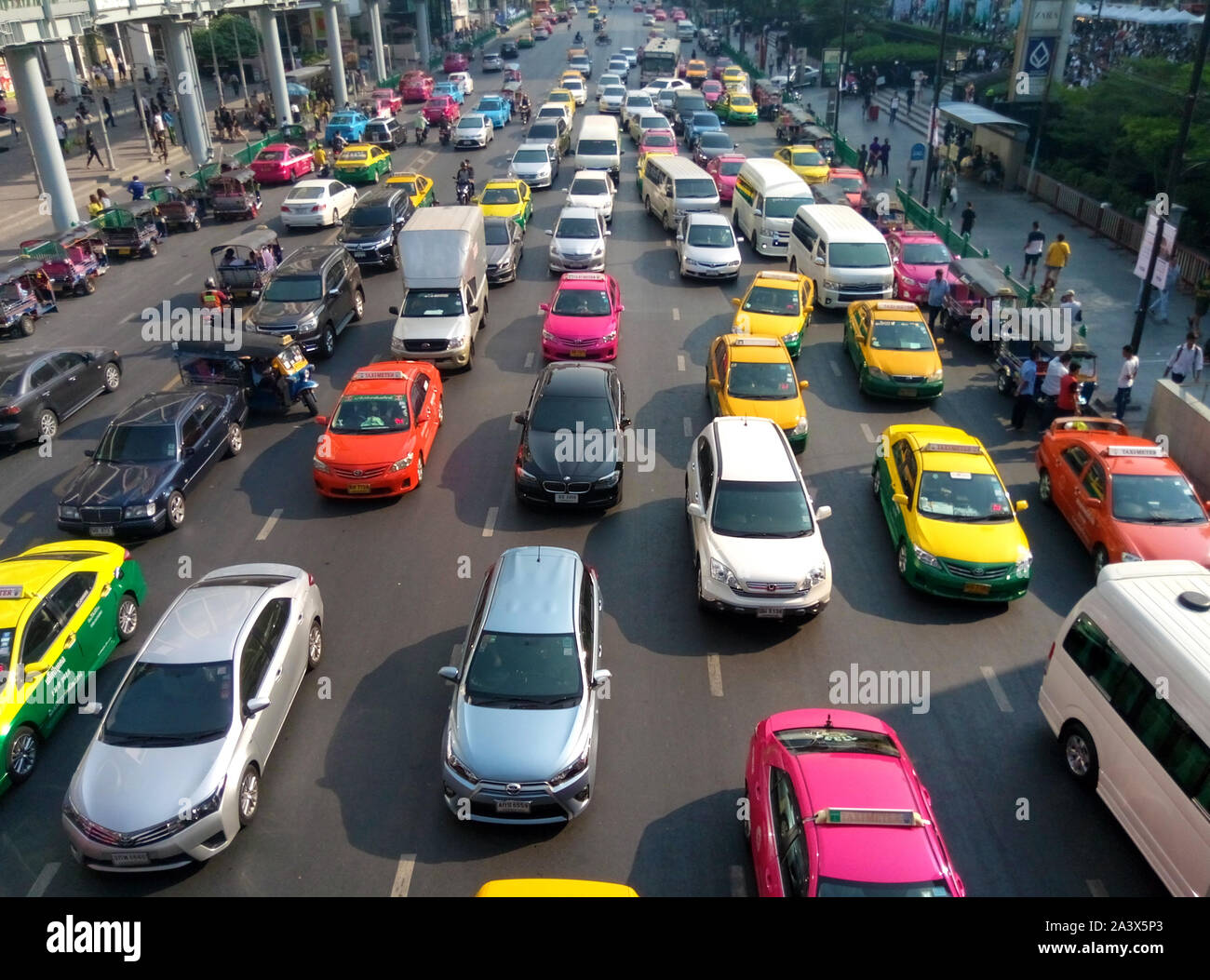 top view of a wide street with multi-lane traffic, heavy traffic from ...