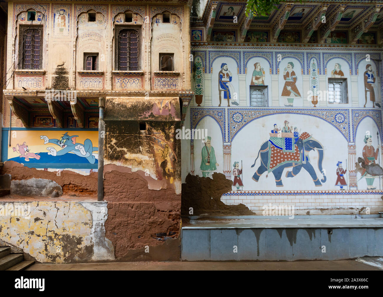 Wall paintings on an old haveli tuned into a school, Rajasthan ...