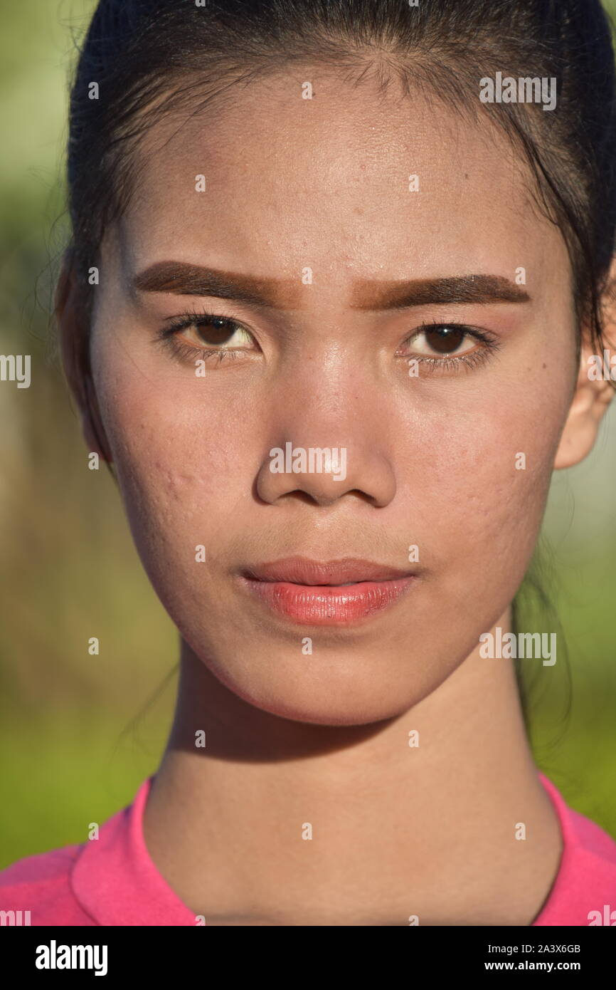 An Unemotional Pretty Minority Adult Female Stock Photo - Alamy