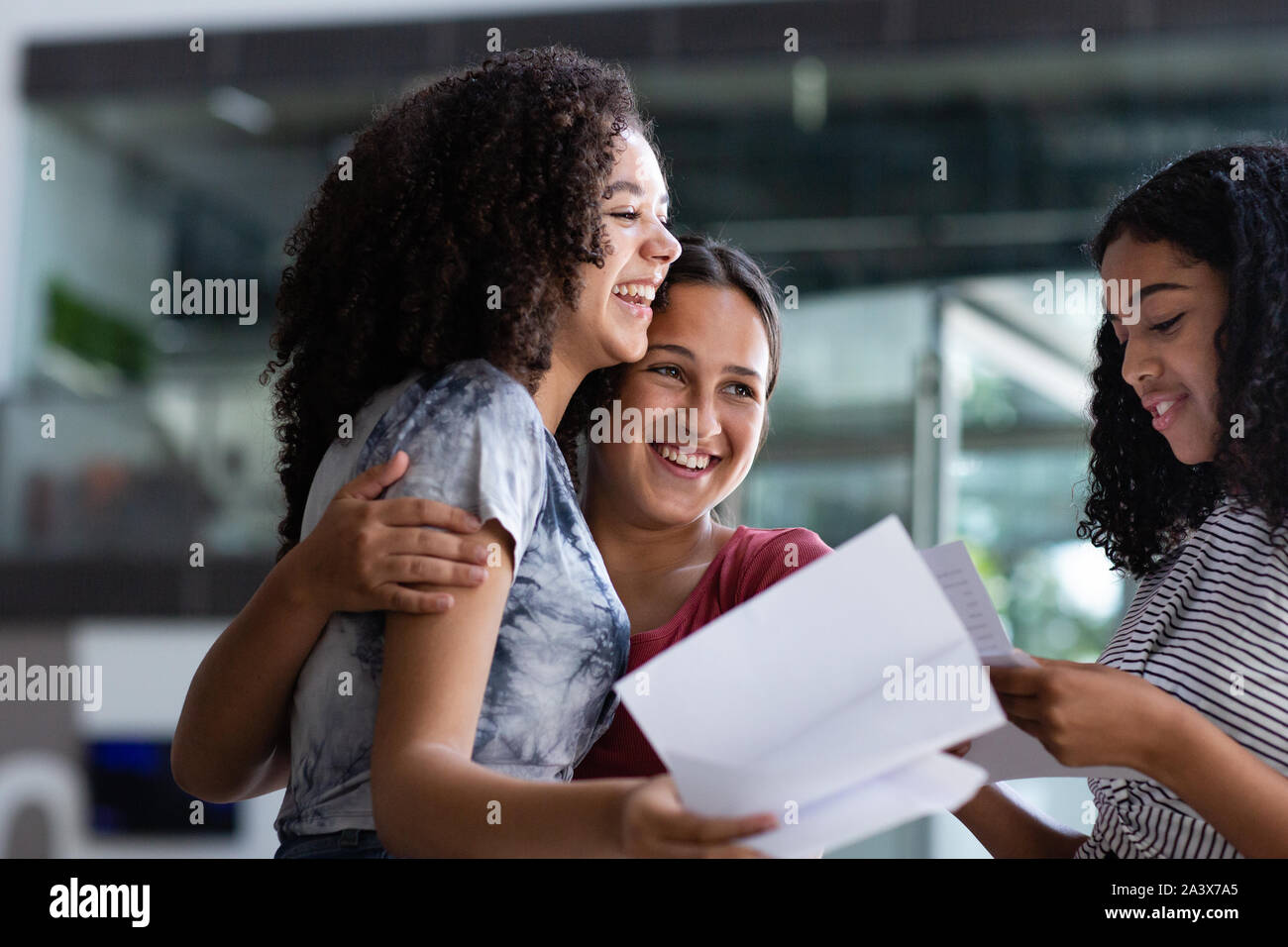 Girl opening exam results hi-res stock photography and images - Alamy